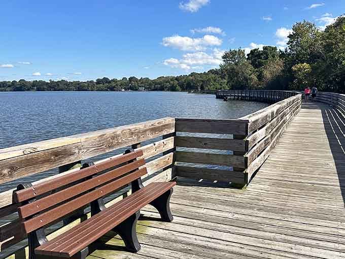 Riverwalk benches invite contemplation along paths where nature provides the soundtrack for free.