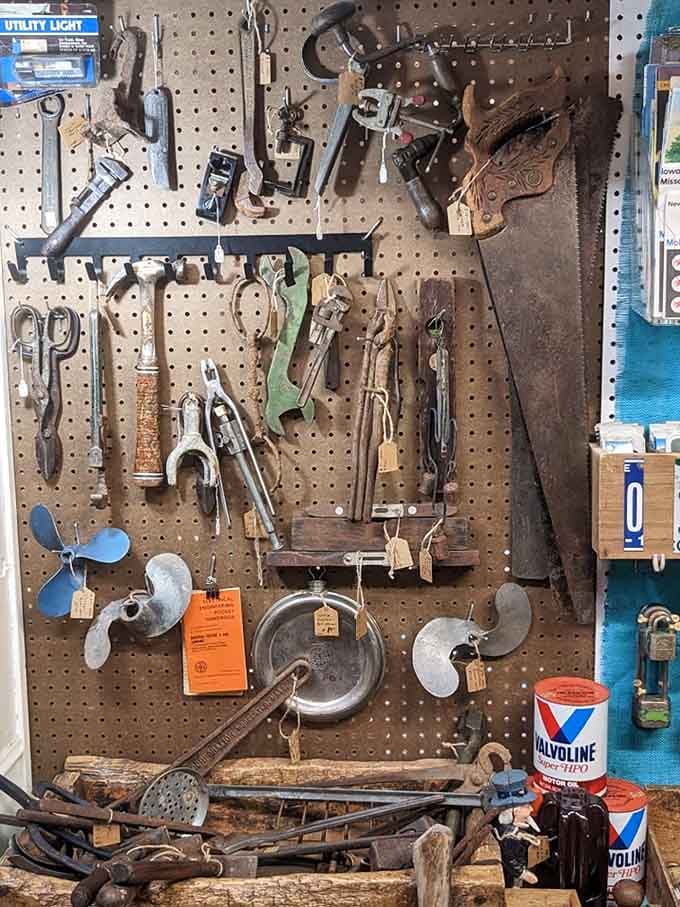 A pegboard full of vintage tools that actually lasted longer than most modern marriages.