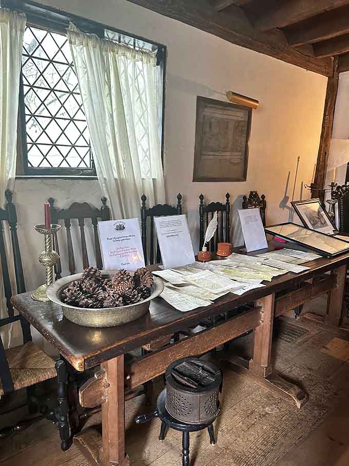 Quill pens and period documents remind us that paperwork has always been tedious, just more flammable then.