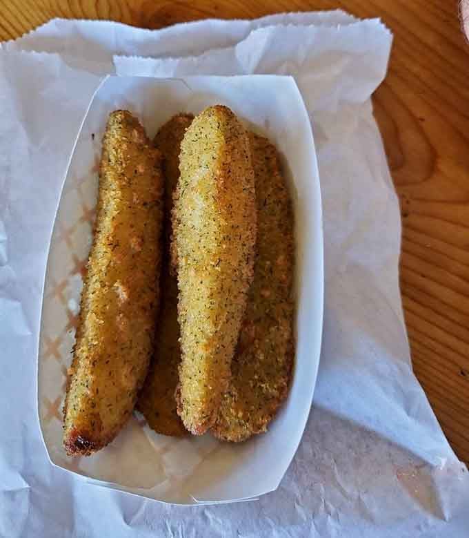Golden fried pickles that prove sometimes the weirdest ideas turn out to be the best ideas ever.