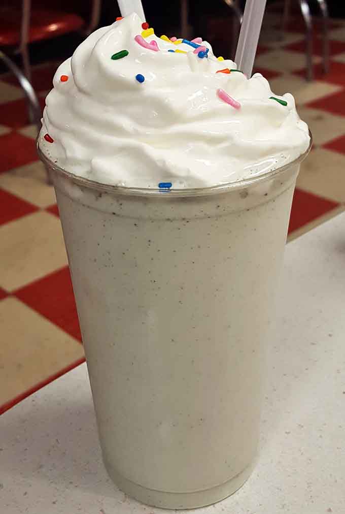 Proof that dairy-free doesn't mean fun-free, topped with enough sprinkles to make a unicorn jealous.