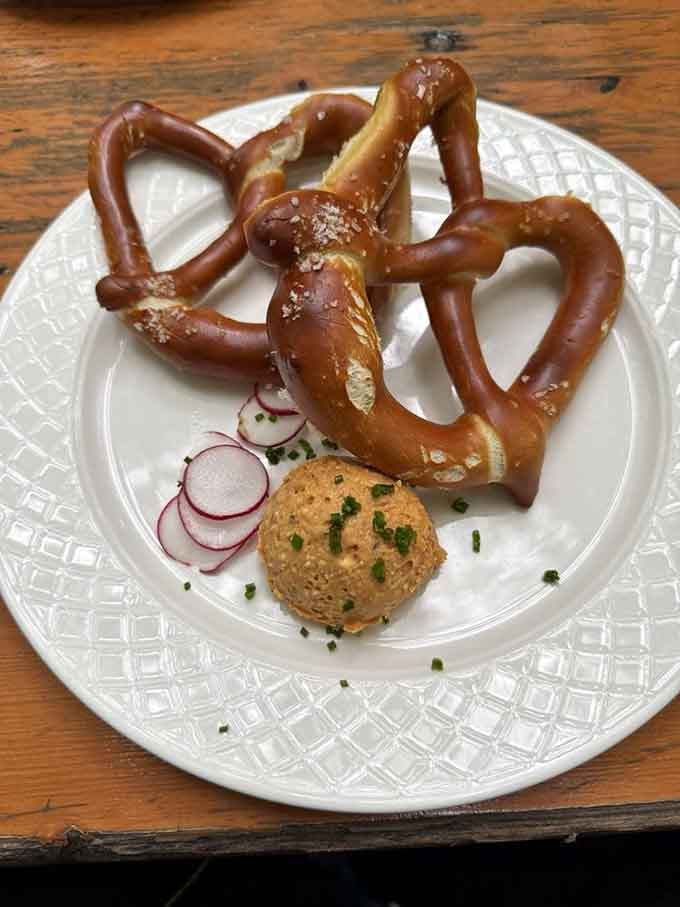 These golden pretzels with obatzda spread are basically Bavaria's love letter to Kentucky, and honestly, we're here for it.