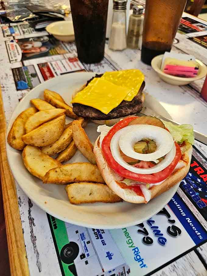 That burger looks like it could solve most of life's problems, served with wedges that deserve their own fan mail.