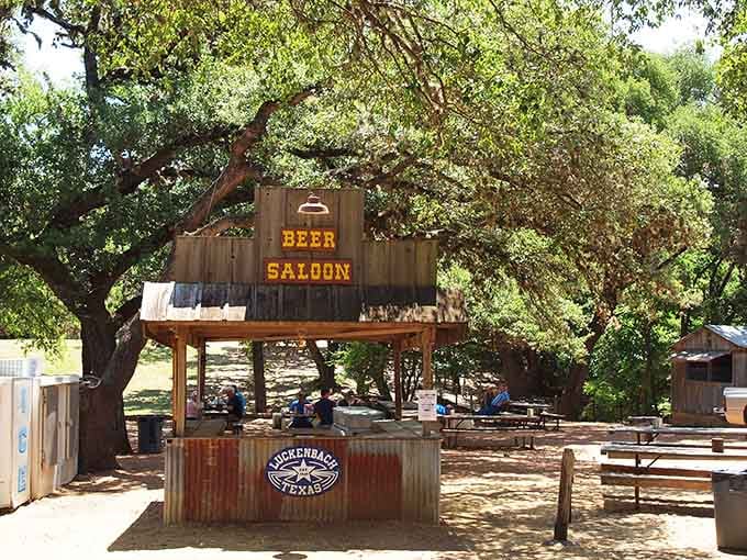 The beer saloon stands ready under the oaks, because every great story needs a proper watering hole nearby.