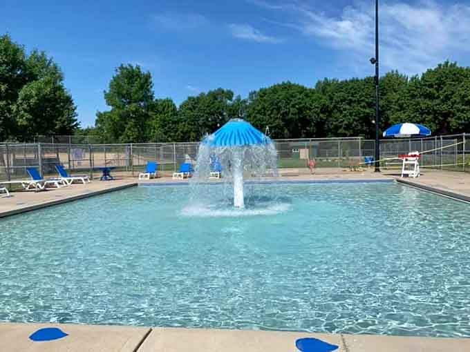 The community pool sparkles under summer sun, offering affordable relief from Minnesota's warm weather days.