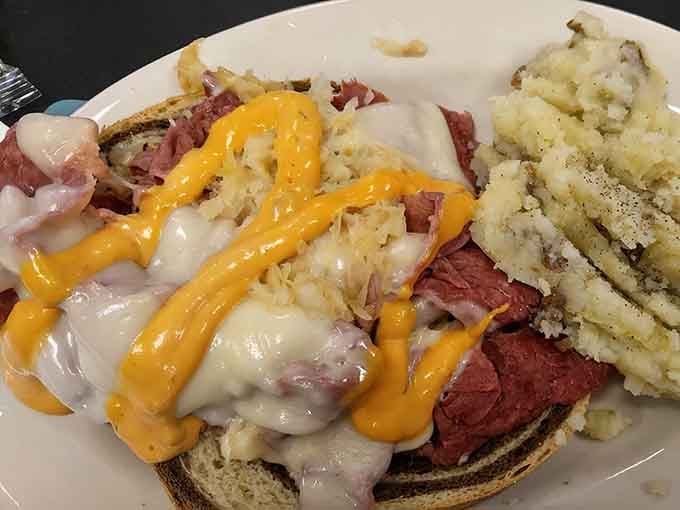 That Reuben is piled so high with corned beef, you'll need both hands and zero regrets.