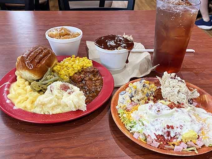 Two plates that prove the buffet strategy: take everything now, regret nothing later, nap immediately.
