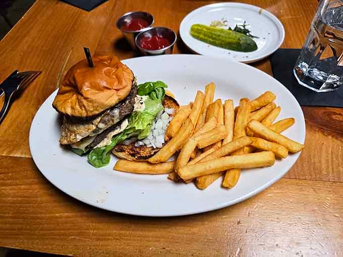 A burger this well-constructed deserves its own architectural award, plus those fries aren't playing around either.