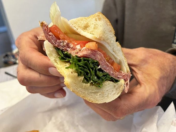 Fresh greens peek out like they're waving hello while generous meat portions remind you why Italian subs are forever.