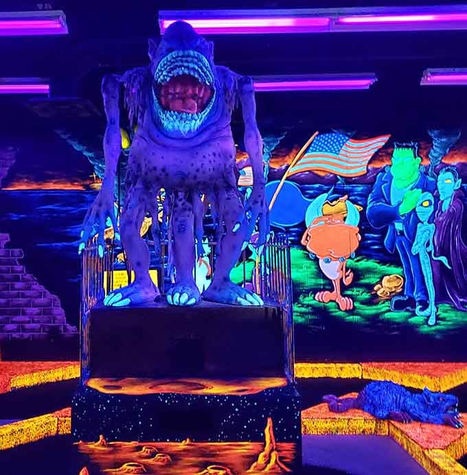 King Kong's got nothing on this blue beast guarding the course like he's protecting his favorite parking spot.