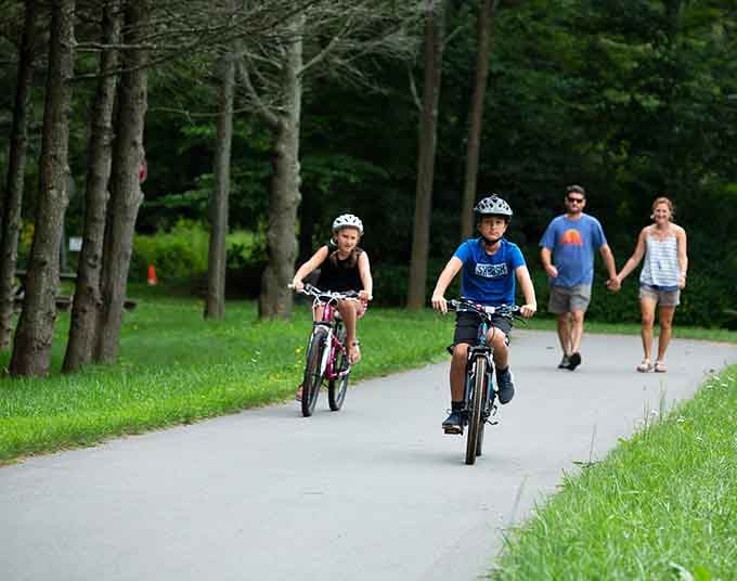 The scenic bike paths wind through the property, offering a perfectly normal activity before you go back inside to question everything.