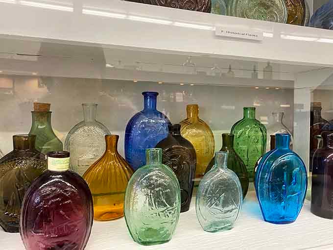 Historical flasks in stunning colors showcase the artistry and craftsmanship of early American glassmakers and their techniques.