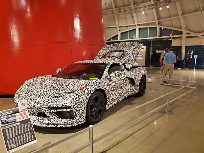 That wild camouflage wrap isn't fooling anyone; this prototype's curves scream future Corvette louder than any press release.