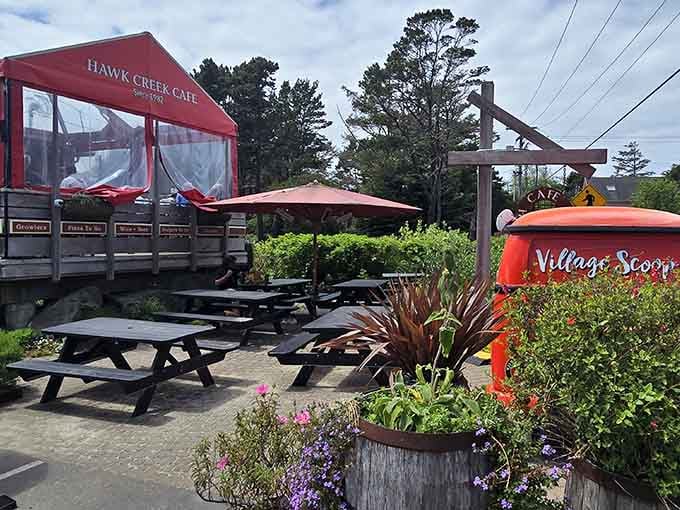 The Cafe on Hawk Creek welcomes hungry beachcombers with outdoor seating that turns every meal into a coastal celebration.