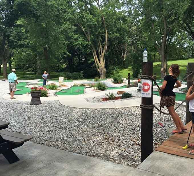Because every great cave needs mini golf topside, proving that fun doesn't stop at ground level.