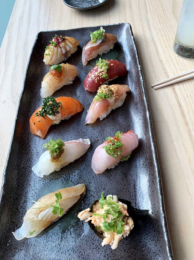 A rainbow of pristine nigiri that proves sometimes the simplest presentations are the most stunning and delicious.