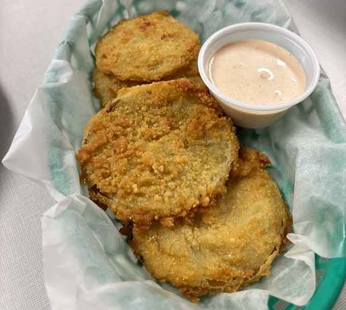 Fried green tomatoes so golden and crispy, they'd make Fannie Flagg weep tears of pure Southern joy.