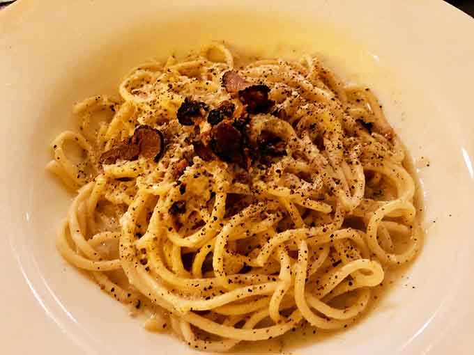 Cacio e Pepe: just cheese, pepper, and pasta, yet somehow it tastes like someone cracked the code to happiness.