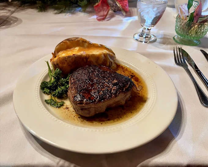 Filet mignon so tender it practically dissolves, paired with a baked potato that's fluffy perfection incarnate.