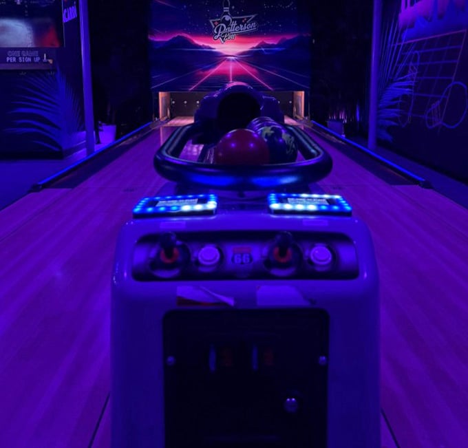 The view from behind the ball return is where dreams are made and gutter balls are born.
