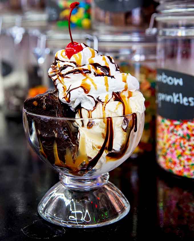 Hot fudge cascading over vanilla ice cream in a classic sundae glass&mdash;some traditions never need updating or improvement.