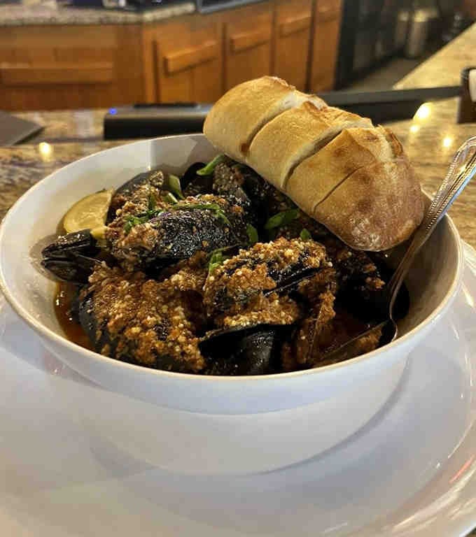 Drunken mussels swimming in broth so good you'll want to drink it straight from the bowl.