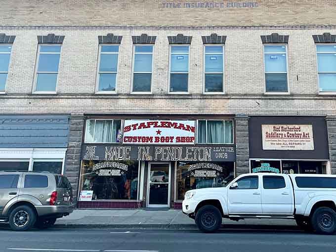 Stapleman's storefront advertises custom boot work, because this is where Western wear means serious business, not costume.