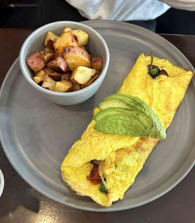When your omelette looks this good, breakfast becomes an all-day affair worth celebrating with roasted potatoes.