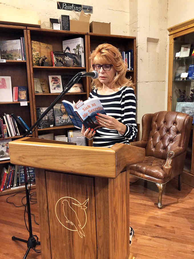 Author readings at a real podium with that gorgeous peregrine logo, because books deserve to be celebrated properly.