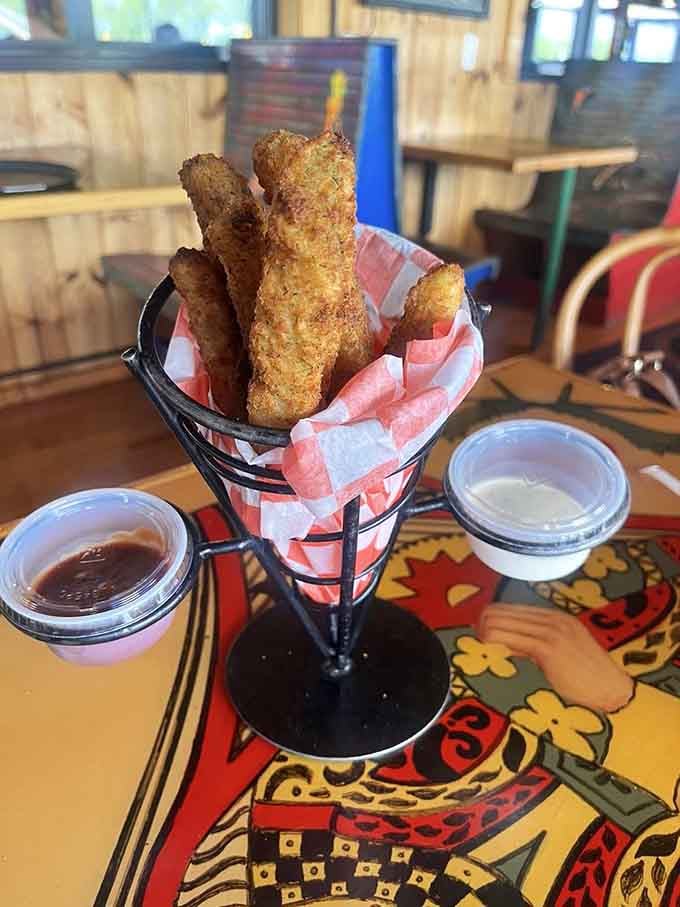 Fried pickles standing at attention like crispy golden soldiers ready to march into your mouth with honor.