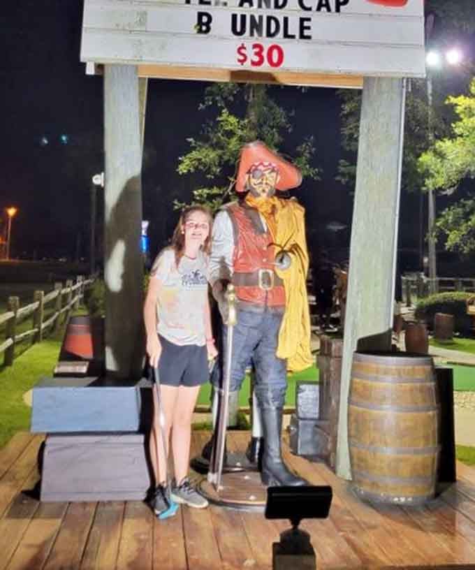 Nothing says family fun quite like posing with a life-sized buccaneer who never complains about your putting skills.