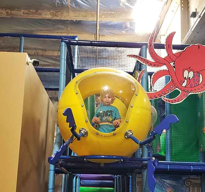 Climb inside that yellow submarine and suddenly every kid thinks they're exploring the Mariana Trench with better lighting.
