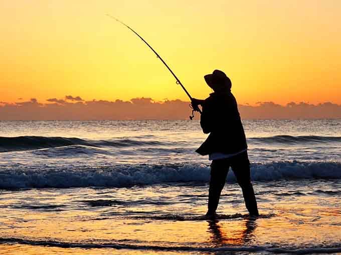 Golden hour fishing at Playalinda turns every cast into a silhouette worthy of a postcard home.