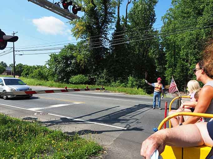 When the crossing gates come down, you know something wonderfully old-fashioned is about to happen.
