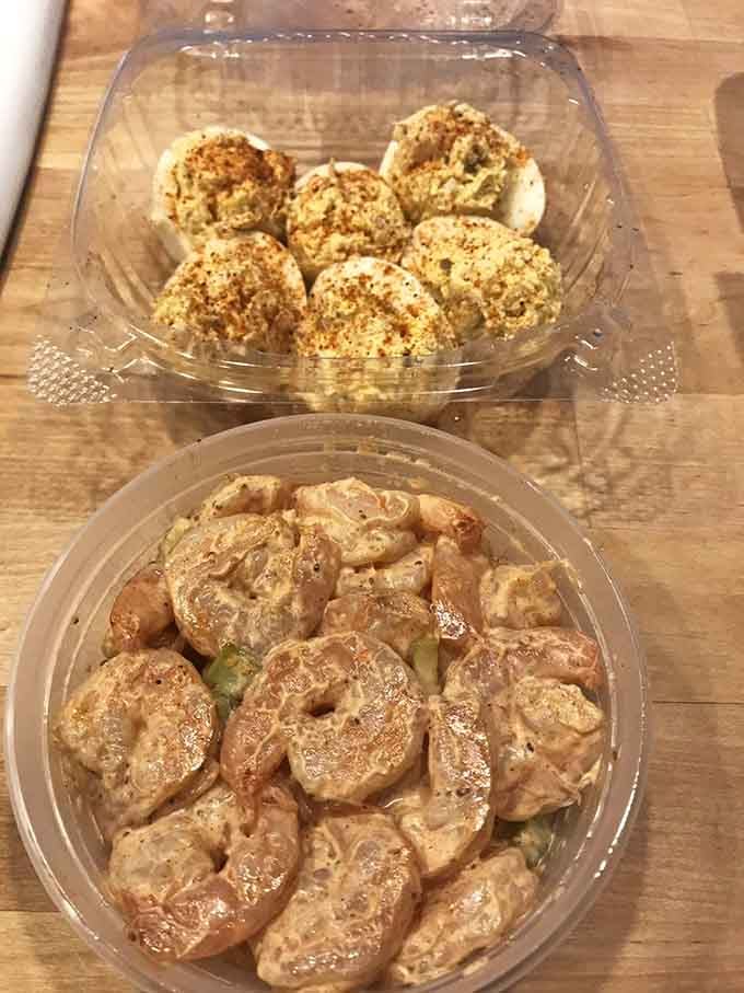 The dynamic duo of Ocean City: creamy deviled crab eggs up top, plump shrimp salad below, both ready to steal your heart.