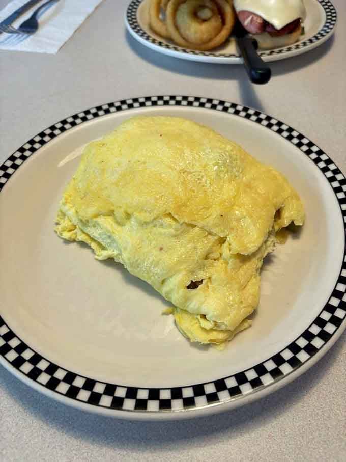 The Lumberjack Omelette lives up to its name, fluffy and generous enough to satisfy even Paul Bunyan himself.