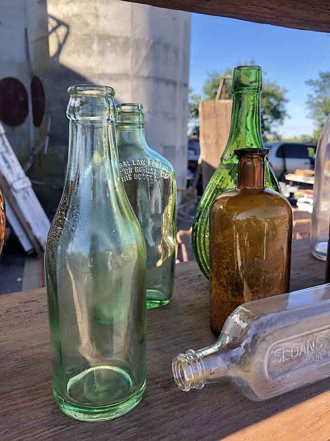 Vintage bottles that once held who-knows-what, now holding stories and memories worth more than their contents ever were.