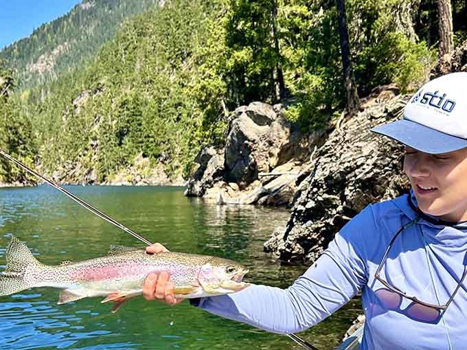 That smile says it all: fresh trout, pristine waters, and a fishing story worth telling.
