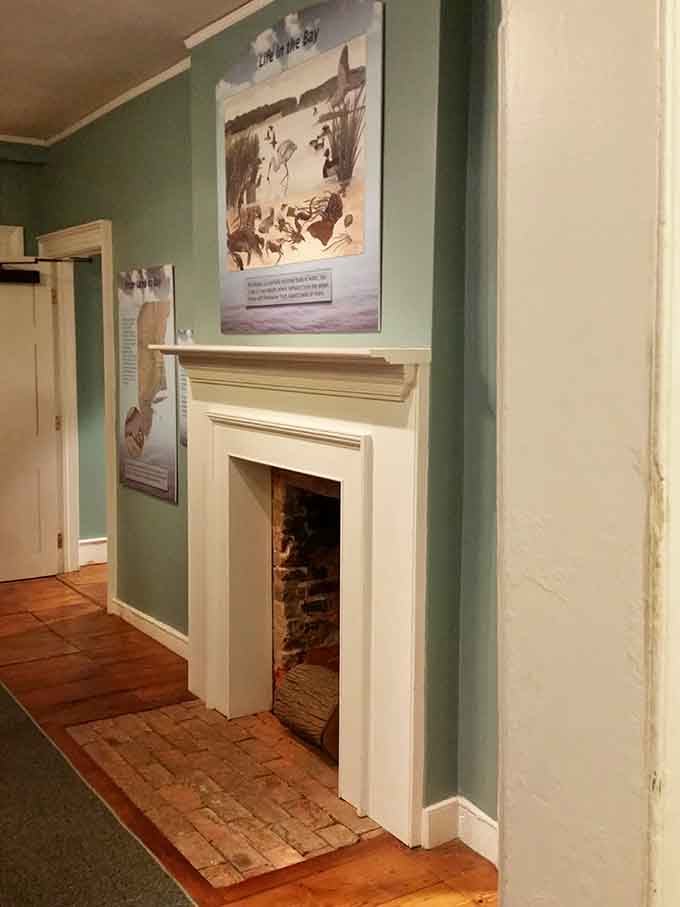 That fireplace has been warming travelers since the 1700s, though some guests never left to feel the cold.