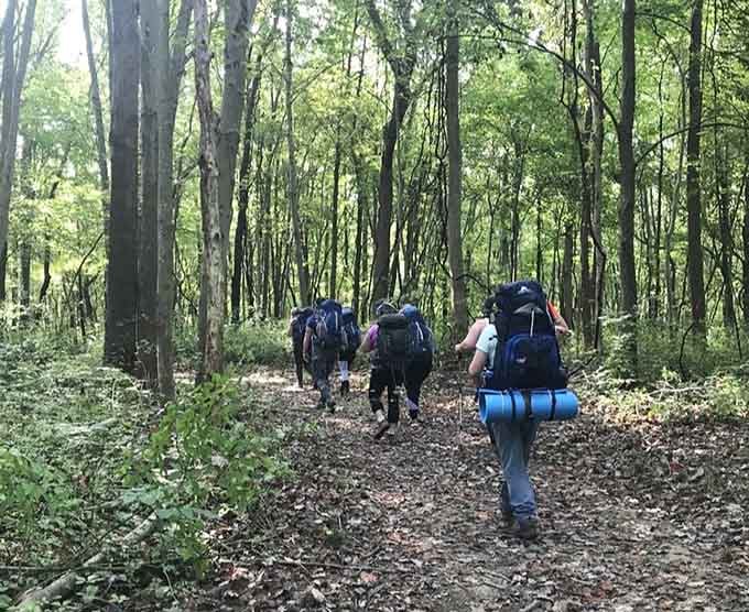These backpackers know something you don't – that the best views require leaving the couch and actually using those hiking boots.