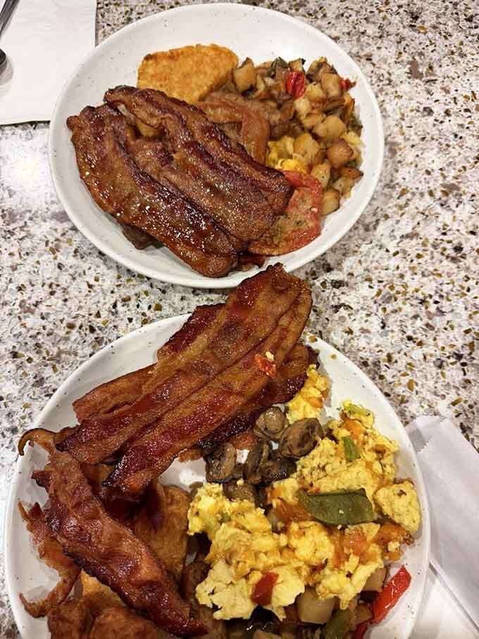 Bacon standing at attention like edible soldiers, ready to make your breakfast dreams come true one crispy strip at a time.