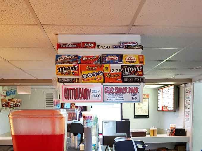 The concession stand menu promises all your favorite treats, because no movie experience is complete without snacks.