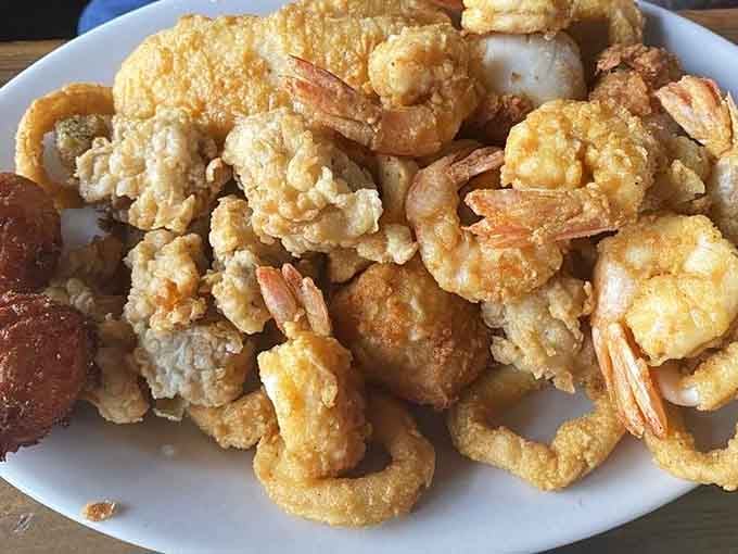 This golden mountain of fried perfection proves that sometimes more is definitely more when it comes to coastal cuisine.