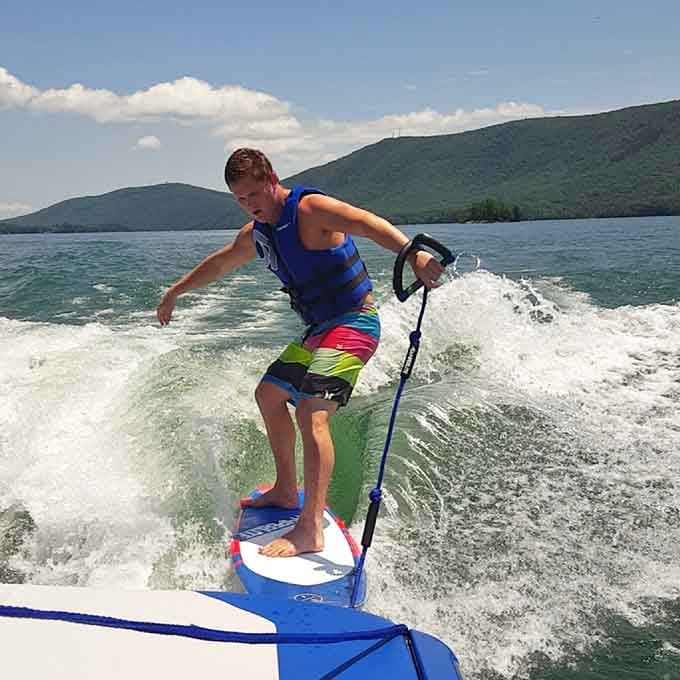 Wakesurfing here means showing off with a backdrop that makes even your wipeouts look cinematic and Instagram-worthy.