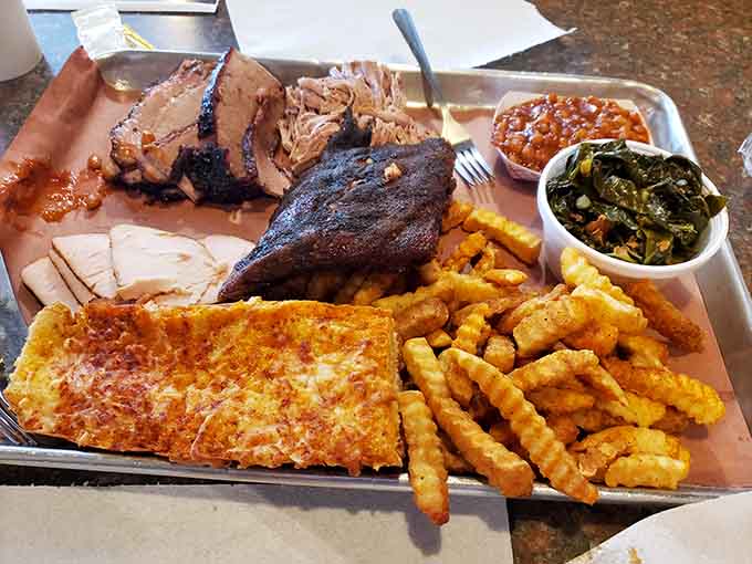This tray holds more smoked meat than most people see in a month, and yes, it's all for you.