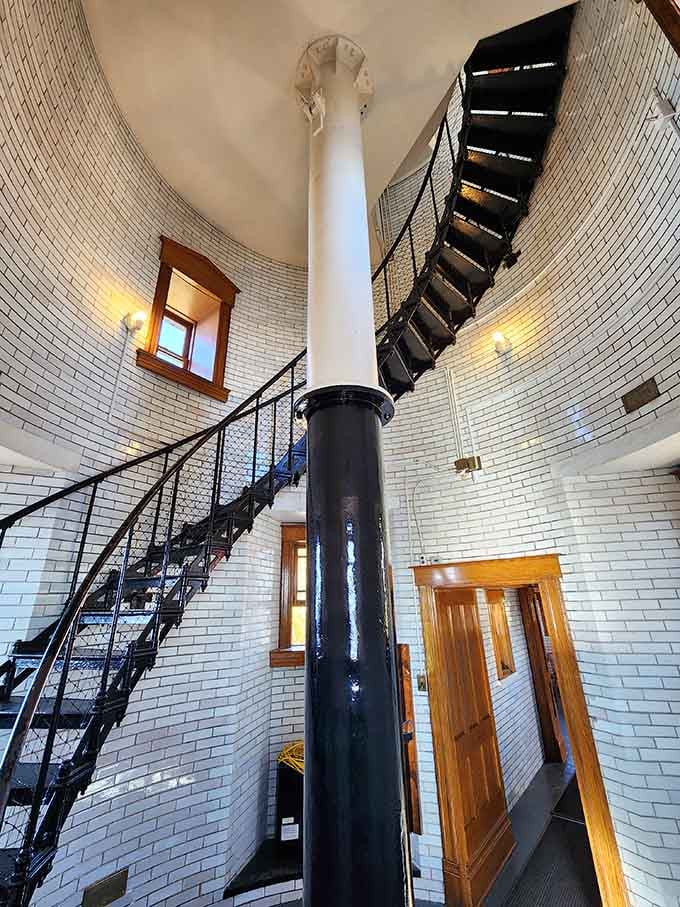 Looking up that spiral staircase feels like staring into a time machine made of iron and determination.
