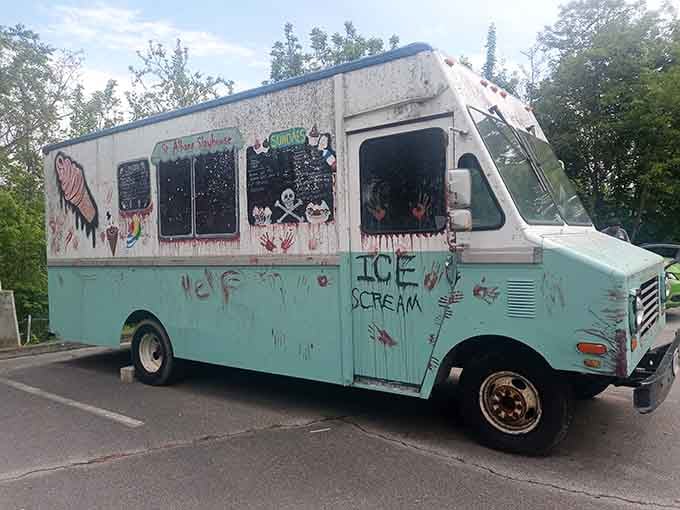 Nothing says "welcoming" quite like a creepy ice cream truck parked outside an abandoned asylum, right?
