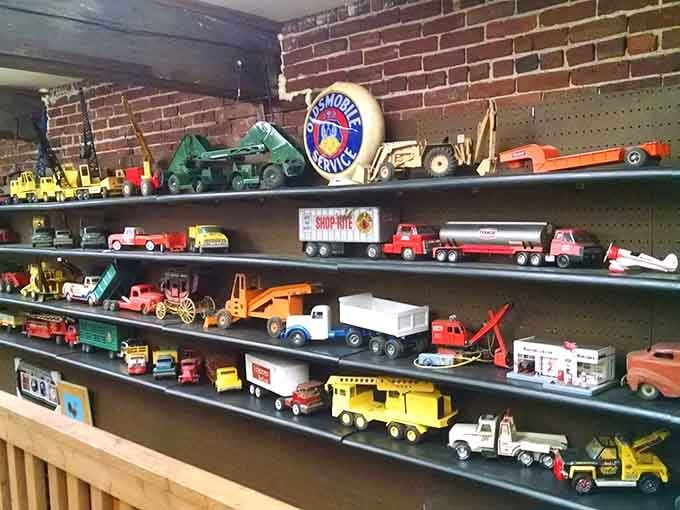 Vintage toy trucks lined up like a miniature parade of American nostalgia and childhood memories.