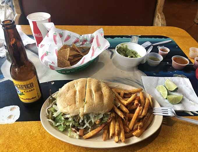That torta is basically a Mexican sandwich that requires a strategy, two hands, and absolutely zero regrets whatsoever.