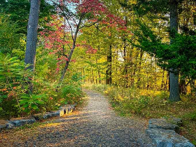 The trail beckons with autumn colors that look like Mother Nature went wild with her paintbrush.